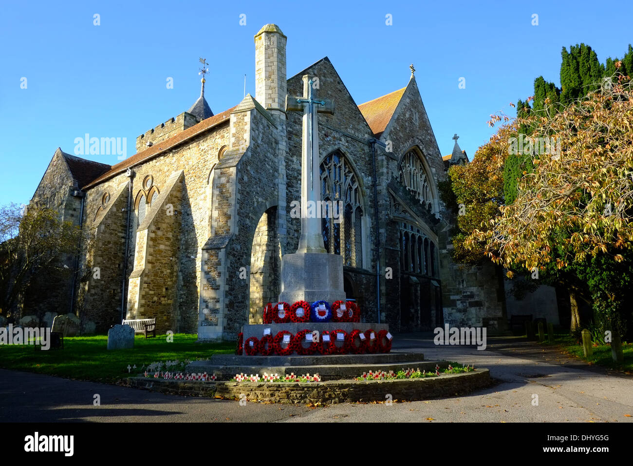 The 12th Century St Mary's Church, Rye, Sussex, UK with poppies for ...