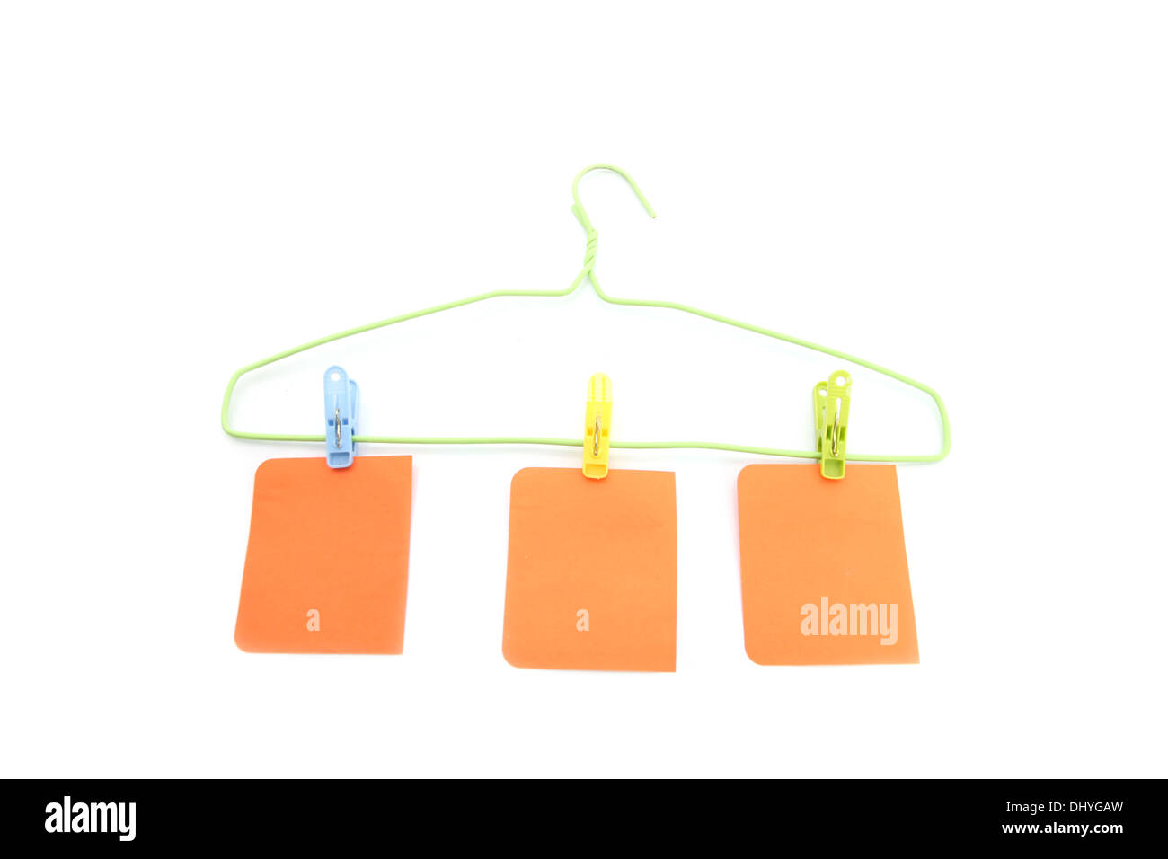 The Note paper and hanger on the white background Stock Photo - Alamy