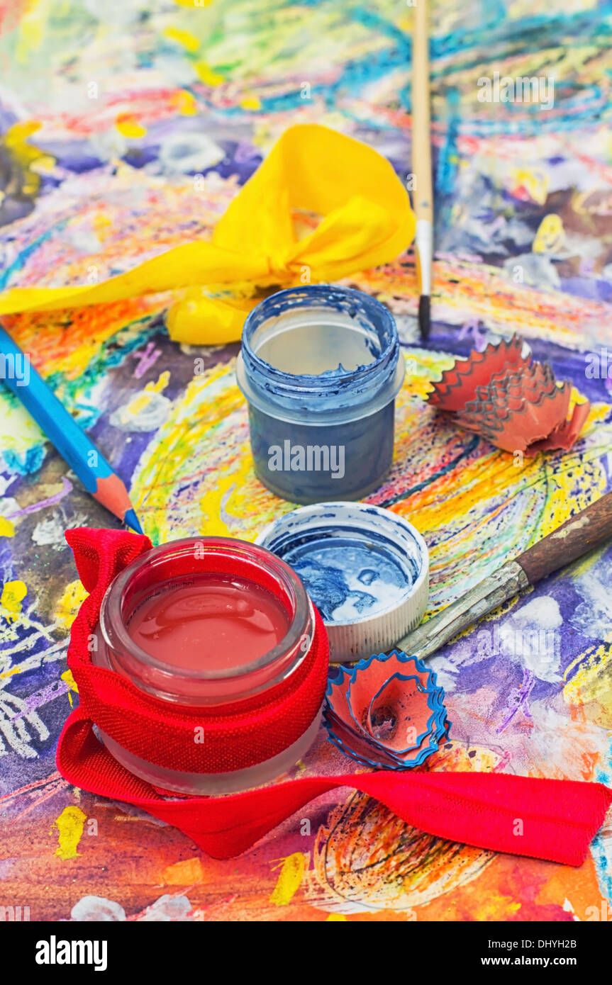 pencils,paint in different colors on the color palette Stock Photo - Alamy