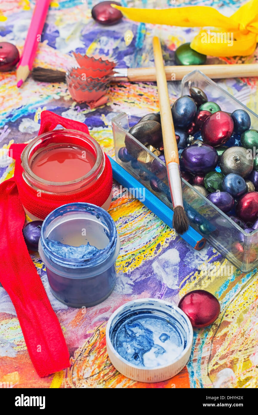 pencils,paint in different colors on the color palette Stock Photo - Alamy