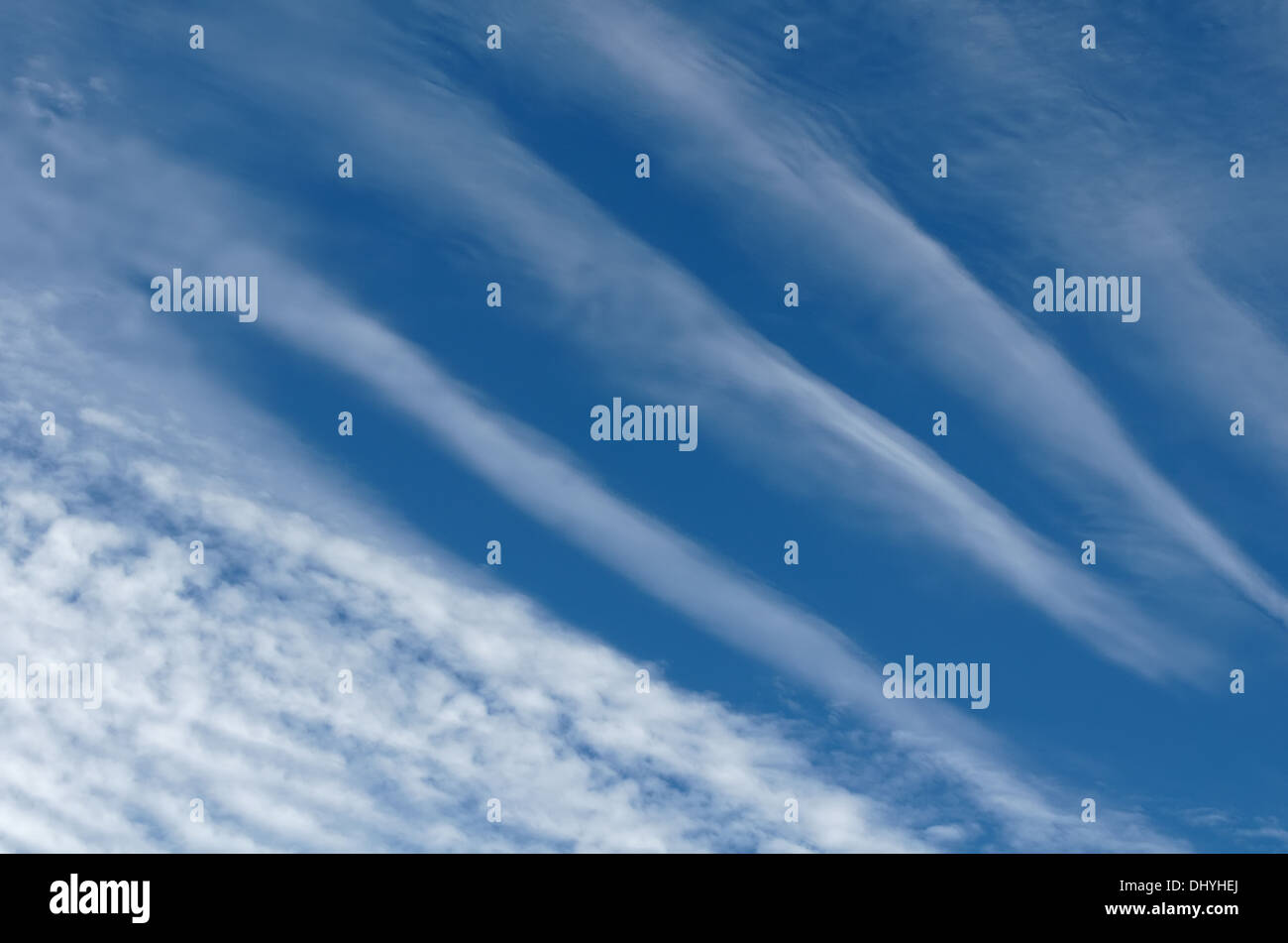 Cirrocumulus clouds and cirrus radiatus Stock Photo - Alamy