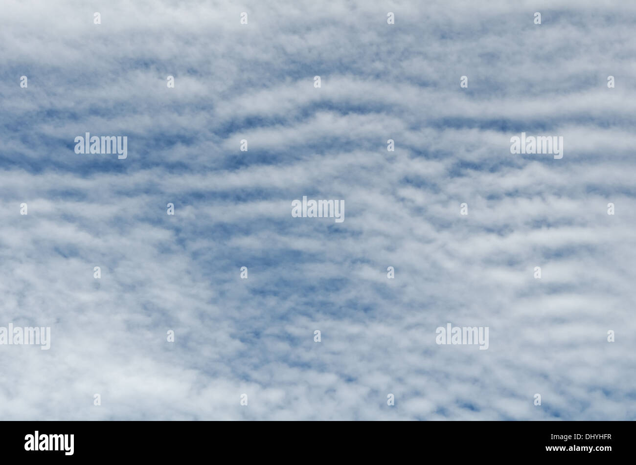 Cirrocumulus clouds and cirrus radiatus Stock Photo - Alamy