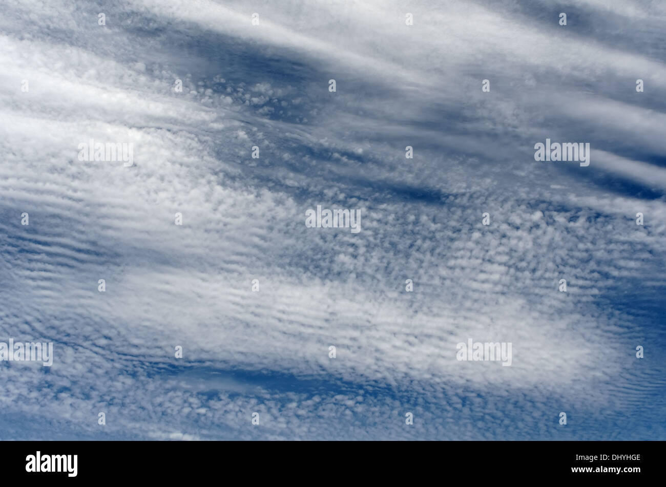Cirrocumulus clouds and cirrus radiatus Stock Photo - Alamy
