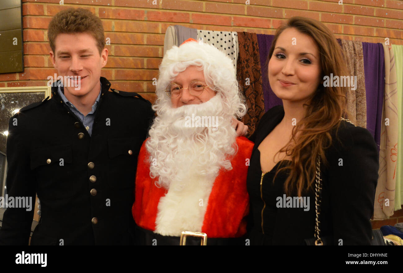 Couple meeting Santa Stock Photo - Alamy