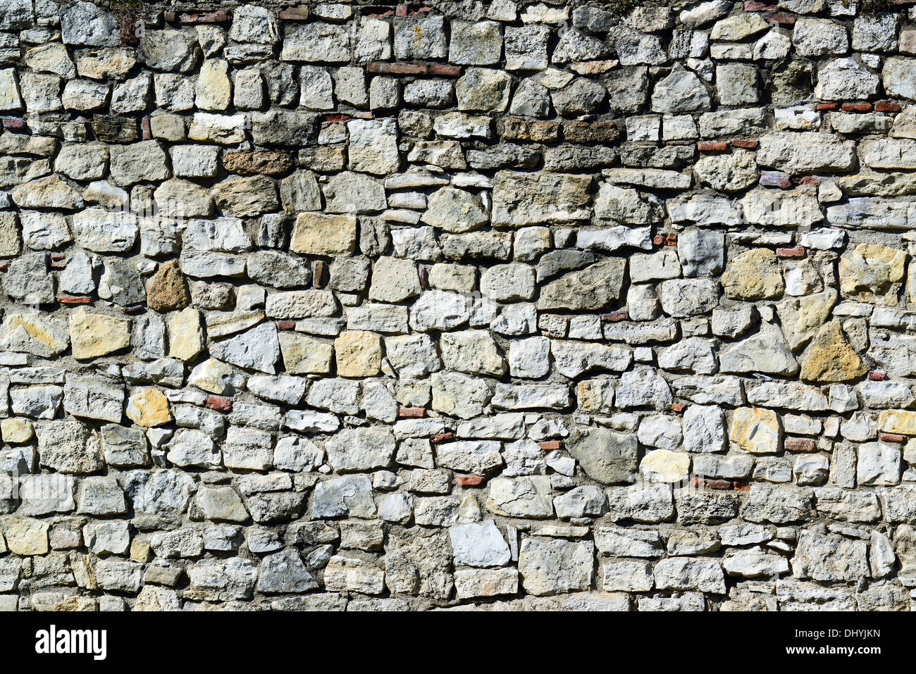 Huge stone wall texture background Stock Photo - Alamy