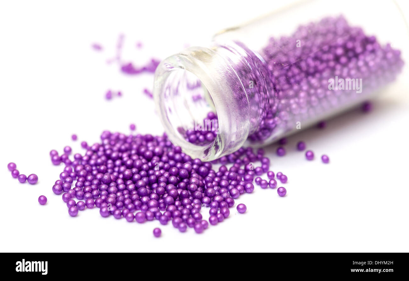 Small Glass Jar filled with Pink Balls of Bead, closeup Stock Photo - Alamy