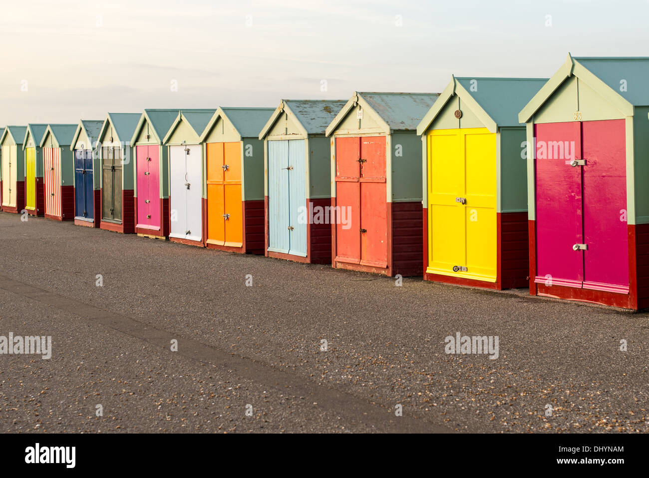 Brightly coloured beach huts Stock Photo - Alamy