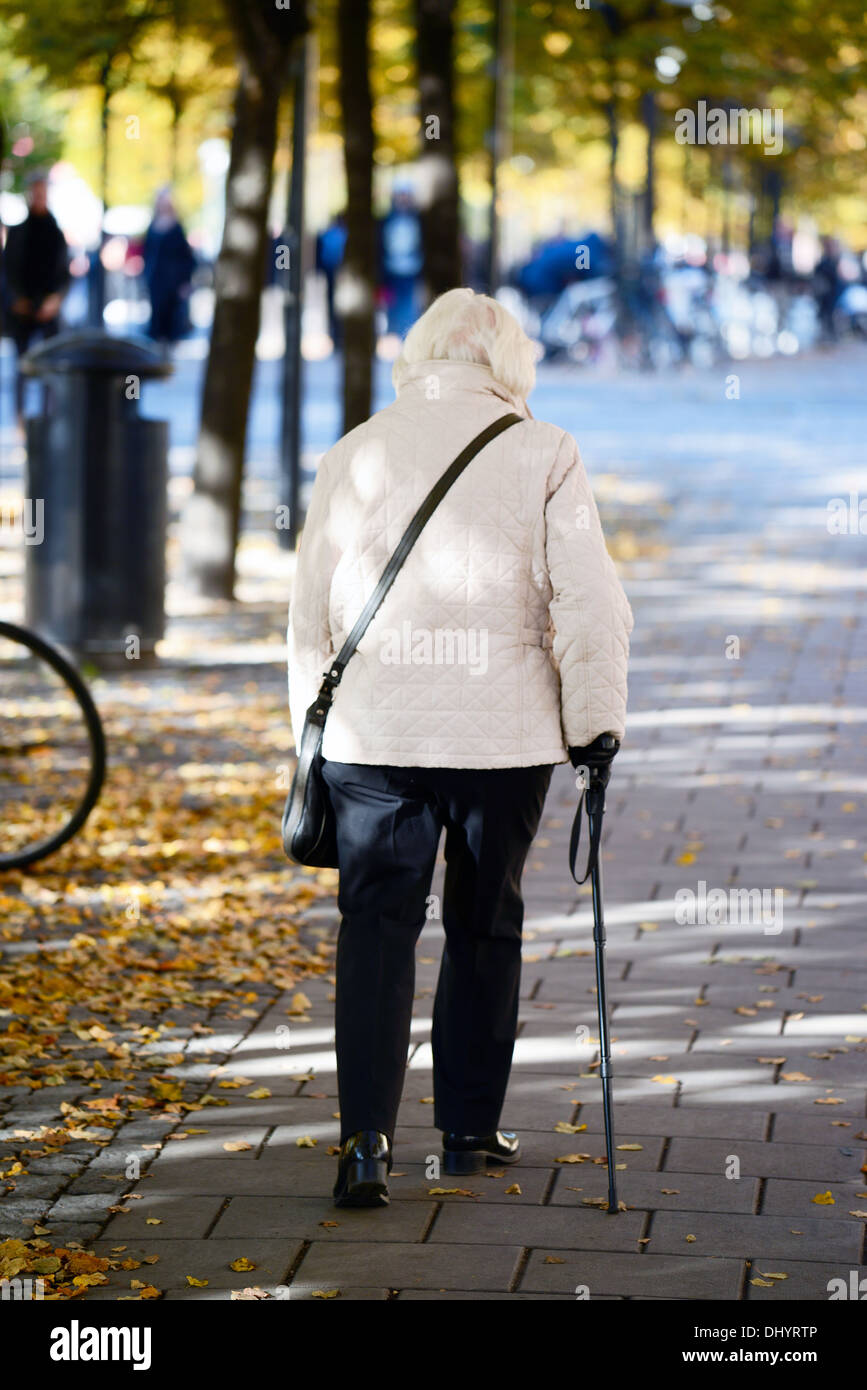 Walking aid stick old age lady woman elderly hi-res stock photography ...