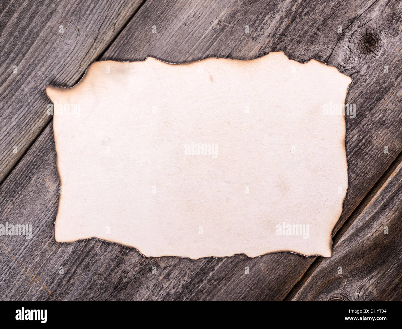 Old paper sheet over wooden background Stock Photo - Alamy