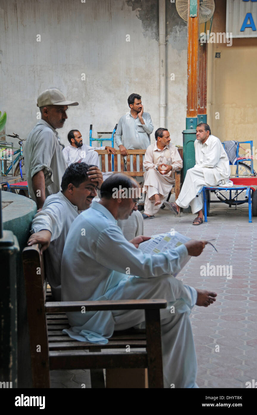 A group of local men, Deira District, Dubai, United Arab Emirates Stock ...