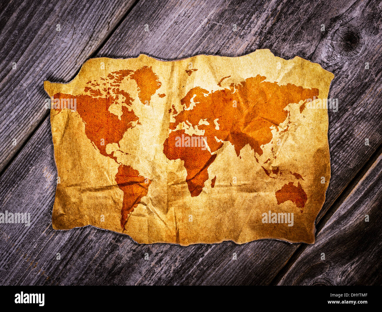 Old world map over wooden background Stock Photo - Alamy