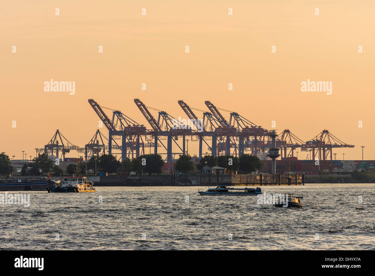 Cranes and shipyards at Elb River port of Hamburg, Germany Stock Photo ...