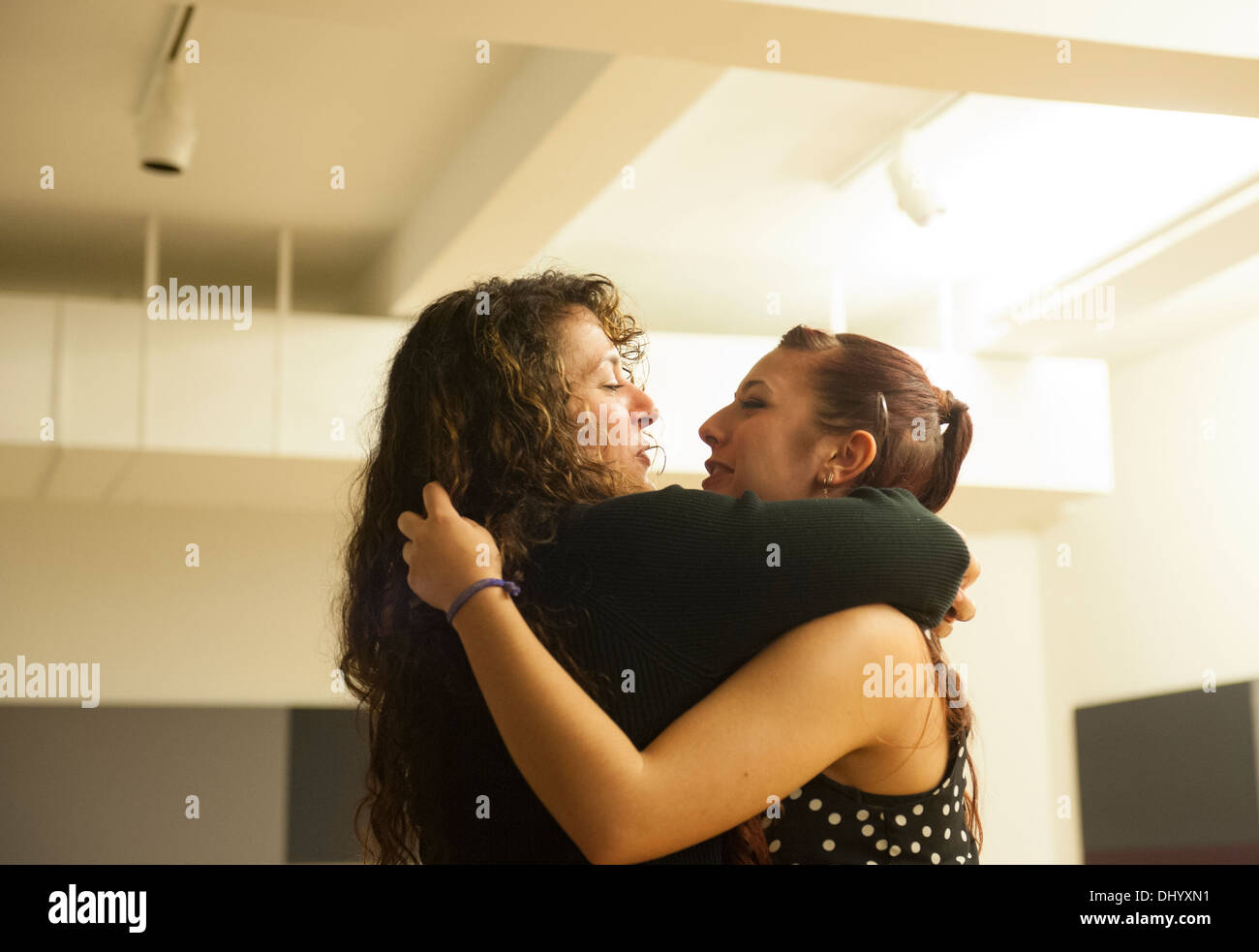 Mother and daughter in an affectionate hug Stock Photo - Alamy