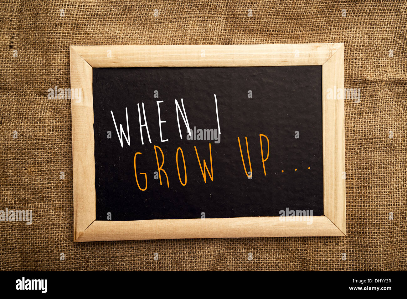 When I grow Up note on black message board Stock Photo - Alamy