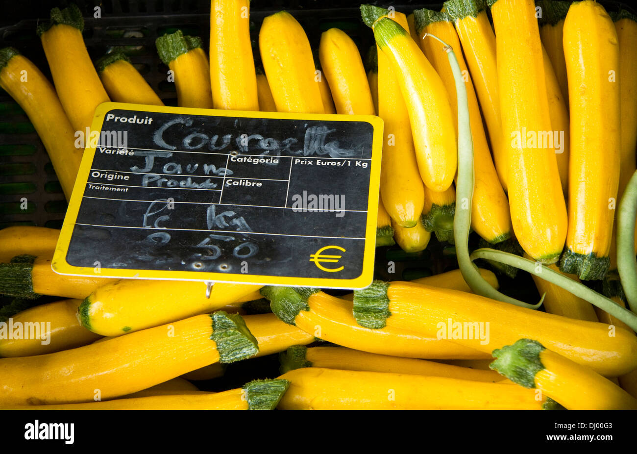 Yellow courgettes on market stall, Digne-les-Bains, France Stock Photo ...