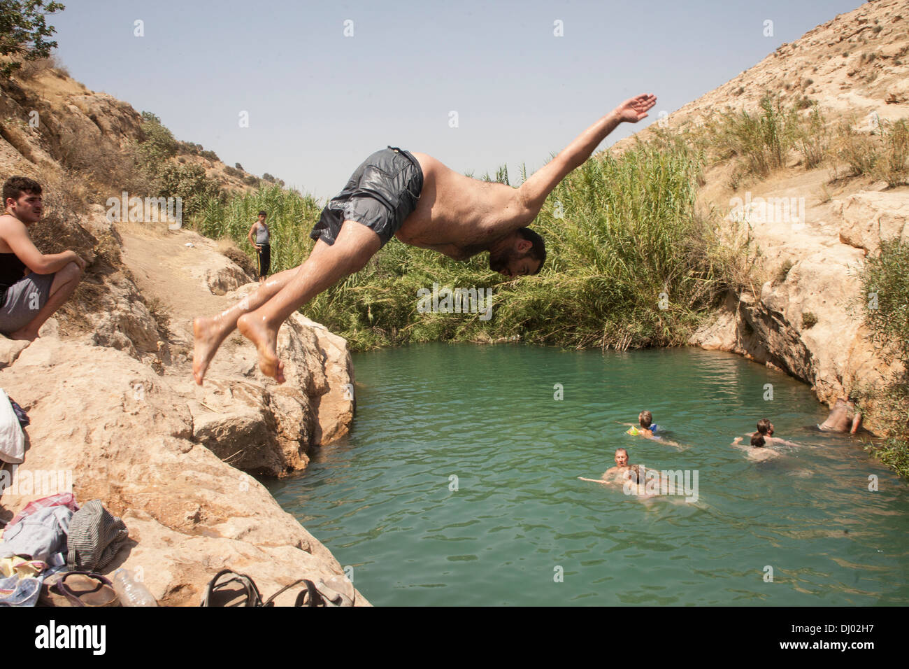 Man diving into pond hi-res stock photography and images - Alamy