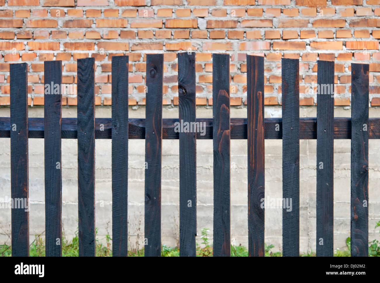 Brick house picket fence hi-res stock photography and images - Alamy