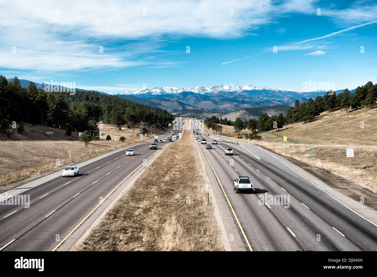 GOLDEN, Colorado - A highway leads to the snow-capped Rocky Mountains ...