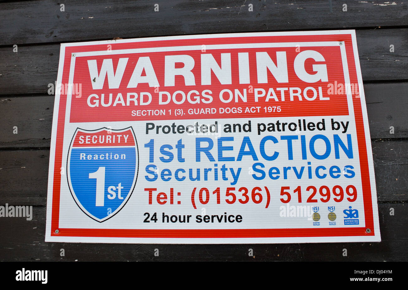 Dog Patrol warning sign reaction force Stock Photo - Alamy