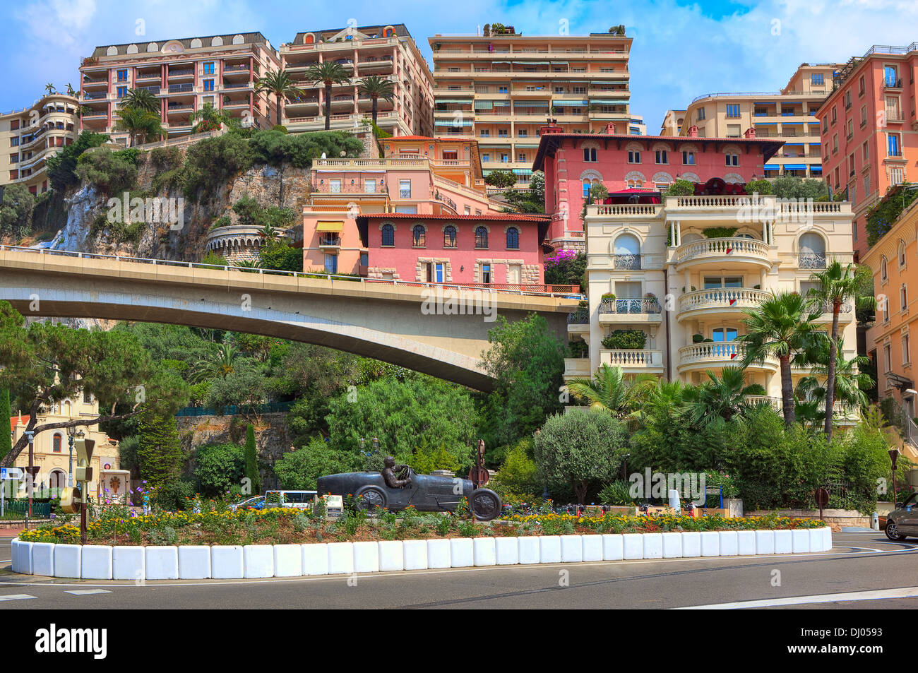 Colorful buildings and sculpture of William Grover-Williams in Bugatti ...