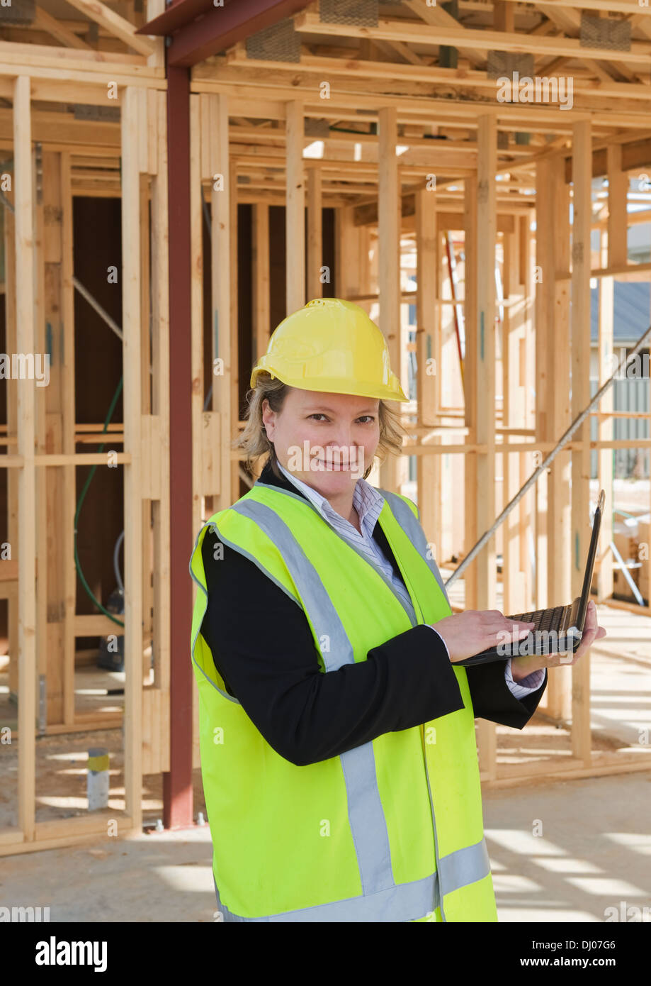 female engineer with laptop at the construction site Stock Photo - Alamy