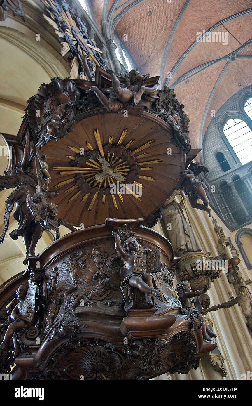 An ornate, carved wood pulpit inside Bruges' Onze Lieve Vrouwekerk (Church of Our Lady) Bruges ...
