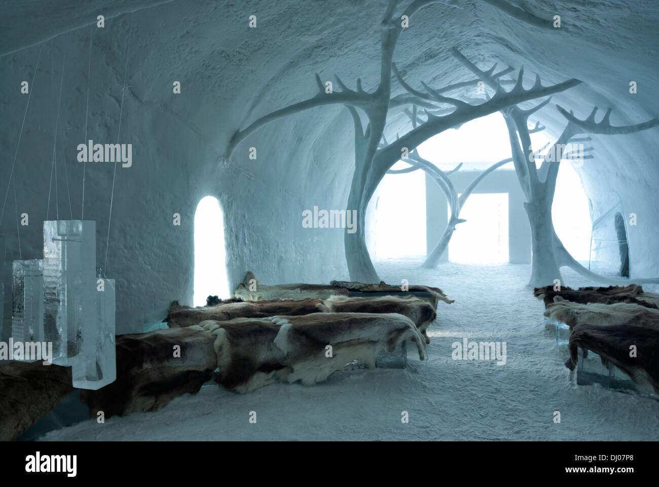 Chapel interior with ice carved decor and reindeer fur-covered ice ...