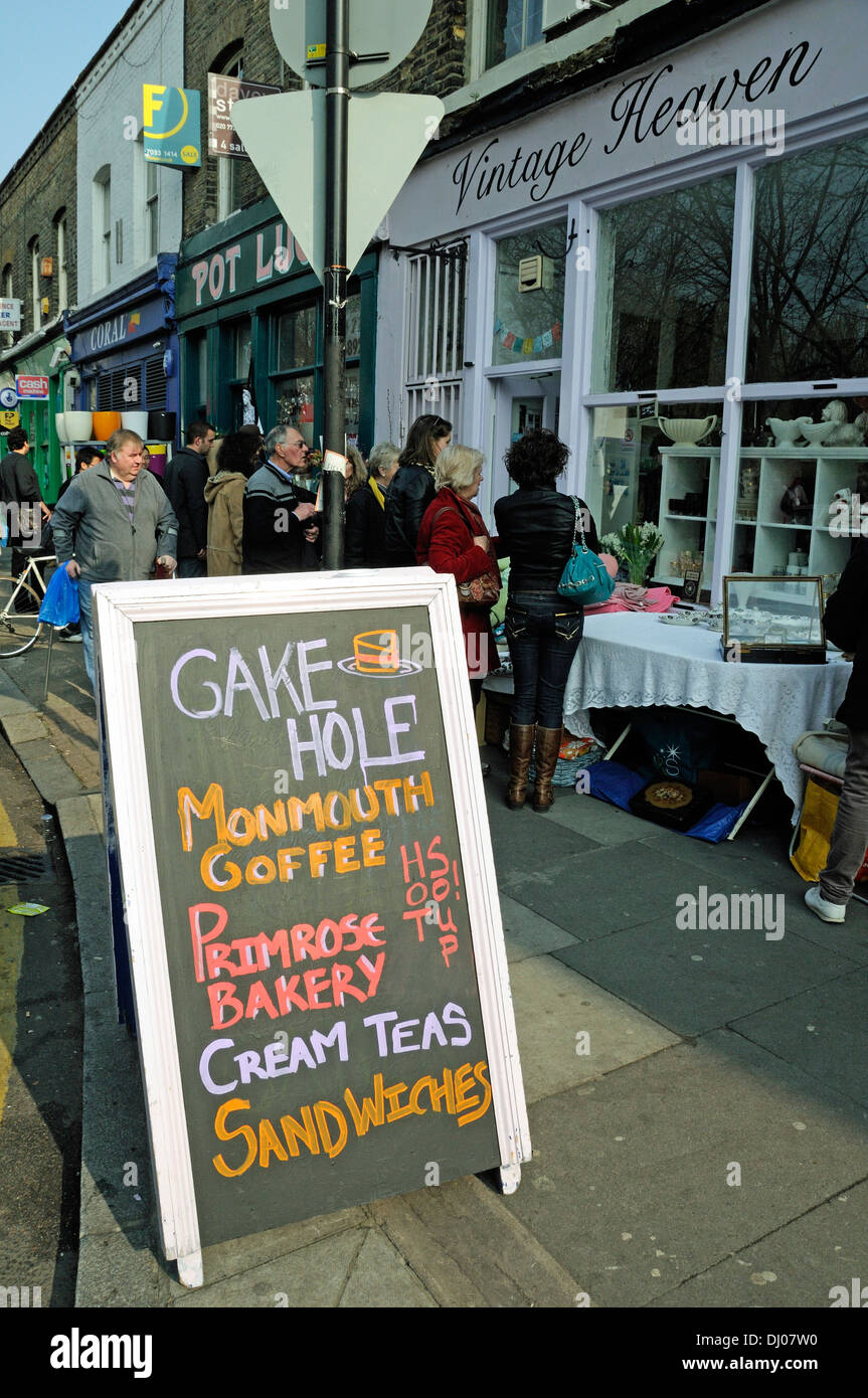 Billboard sign advertising the Cake Hole cafe in Vintage Heaven ...