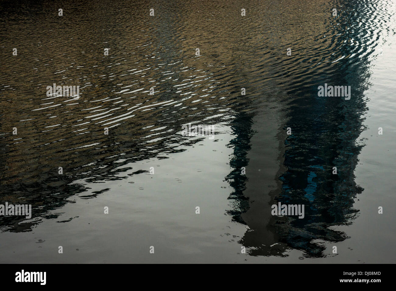 waves water reflection rain drops buildings Stock Photo - Alamy