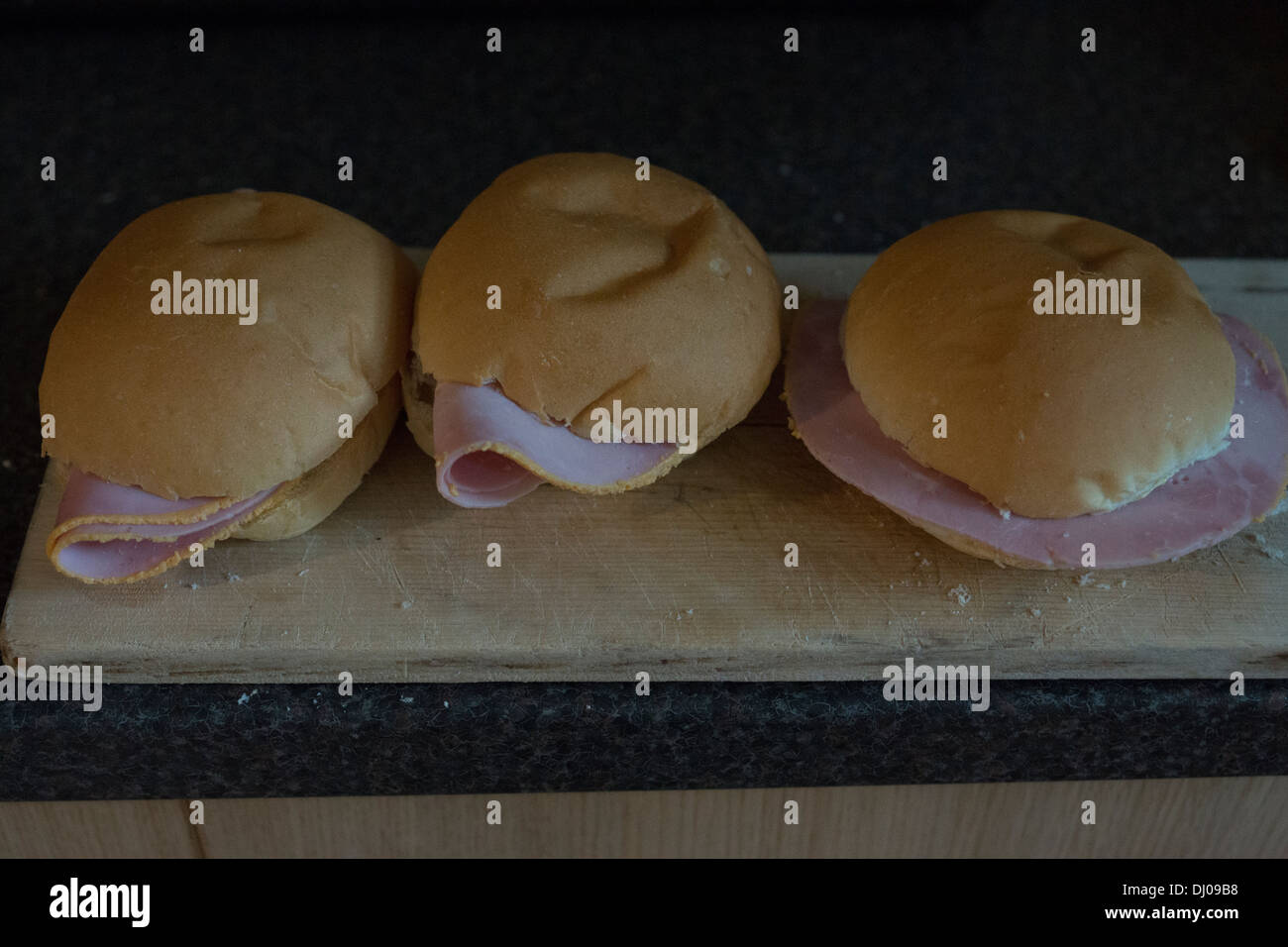 three white soft fresh Ham rolls Stock Photo - Alamy