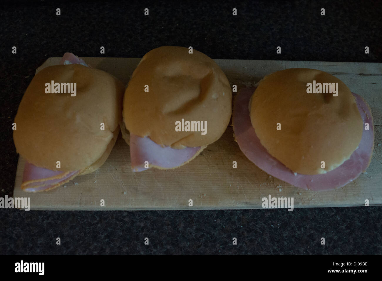 three white soft fresh Ham rolls Stock Photo - Alamy