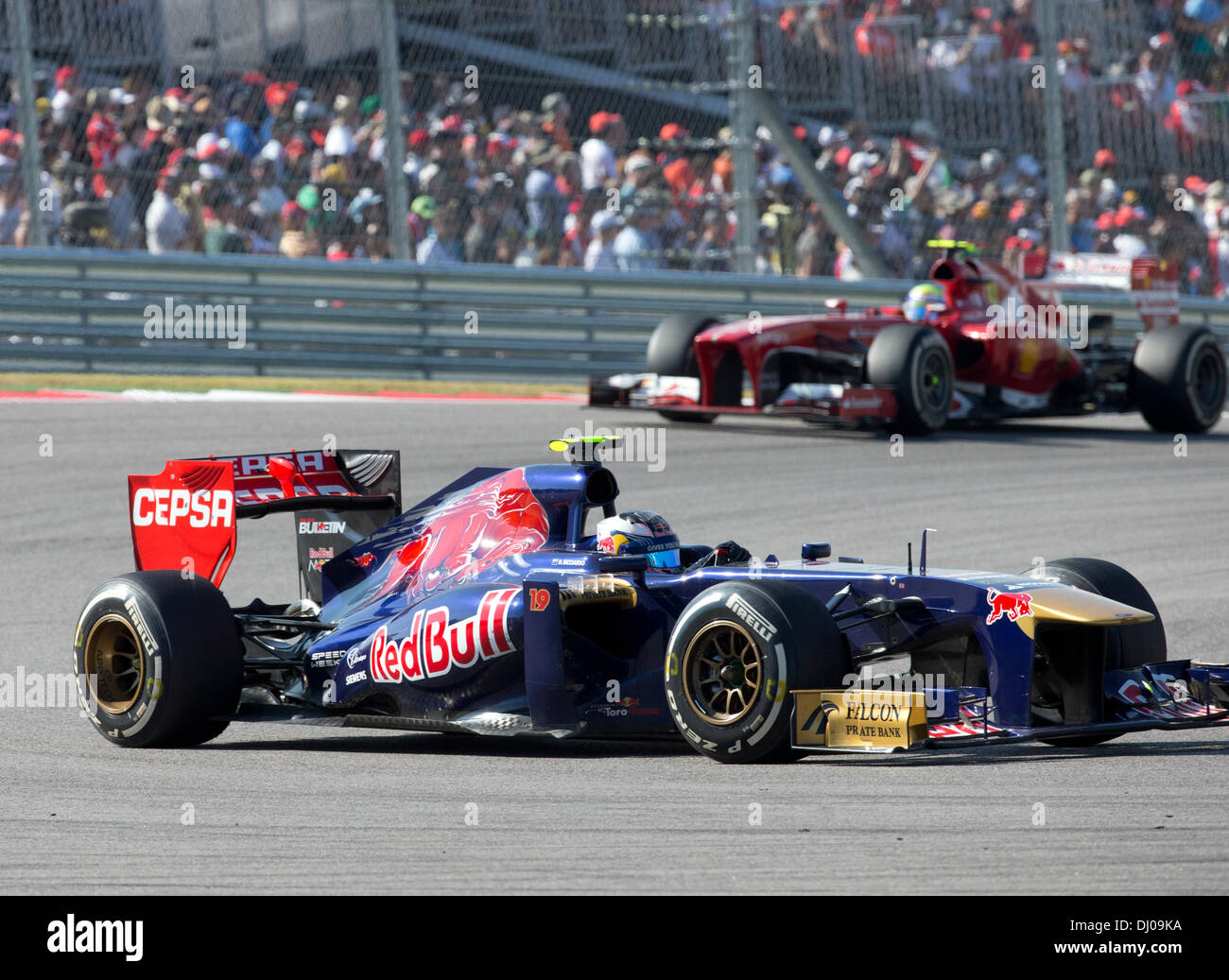 Cars race through a turn during the Formula 1 United States Grand Prix ...