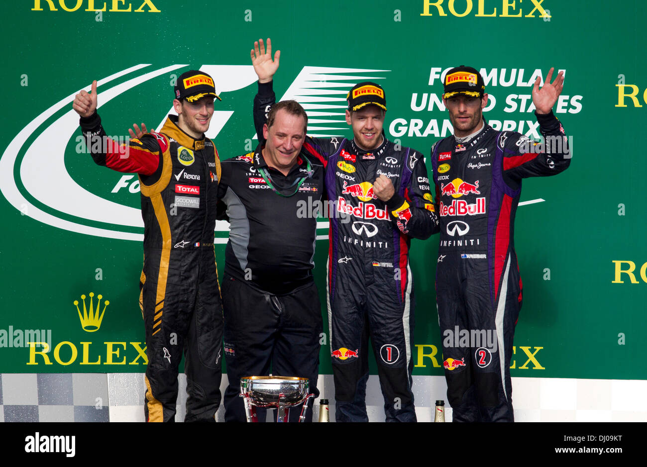 Drivers Romain Grosjean (l) Sebastian Vettel (c) and Mark Webber pose ...