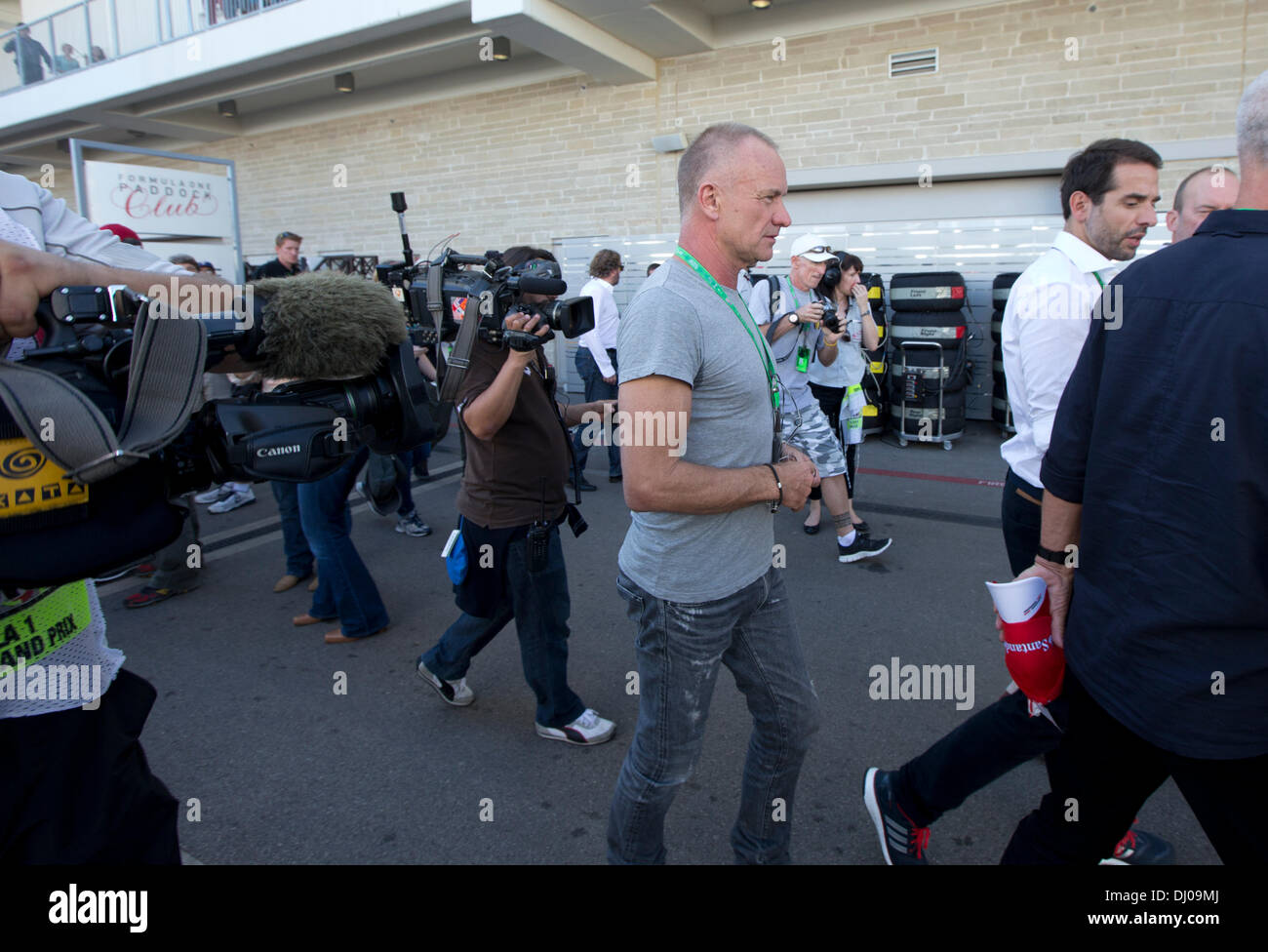 British musician Sting walks through the paddock area during the ...