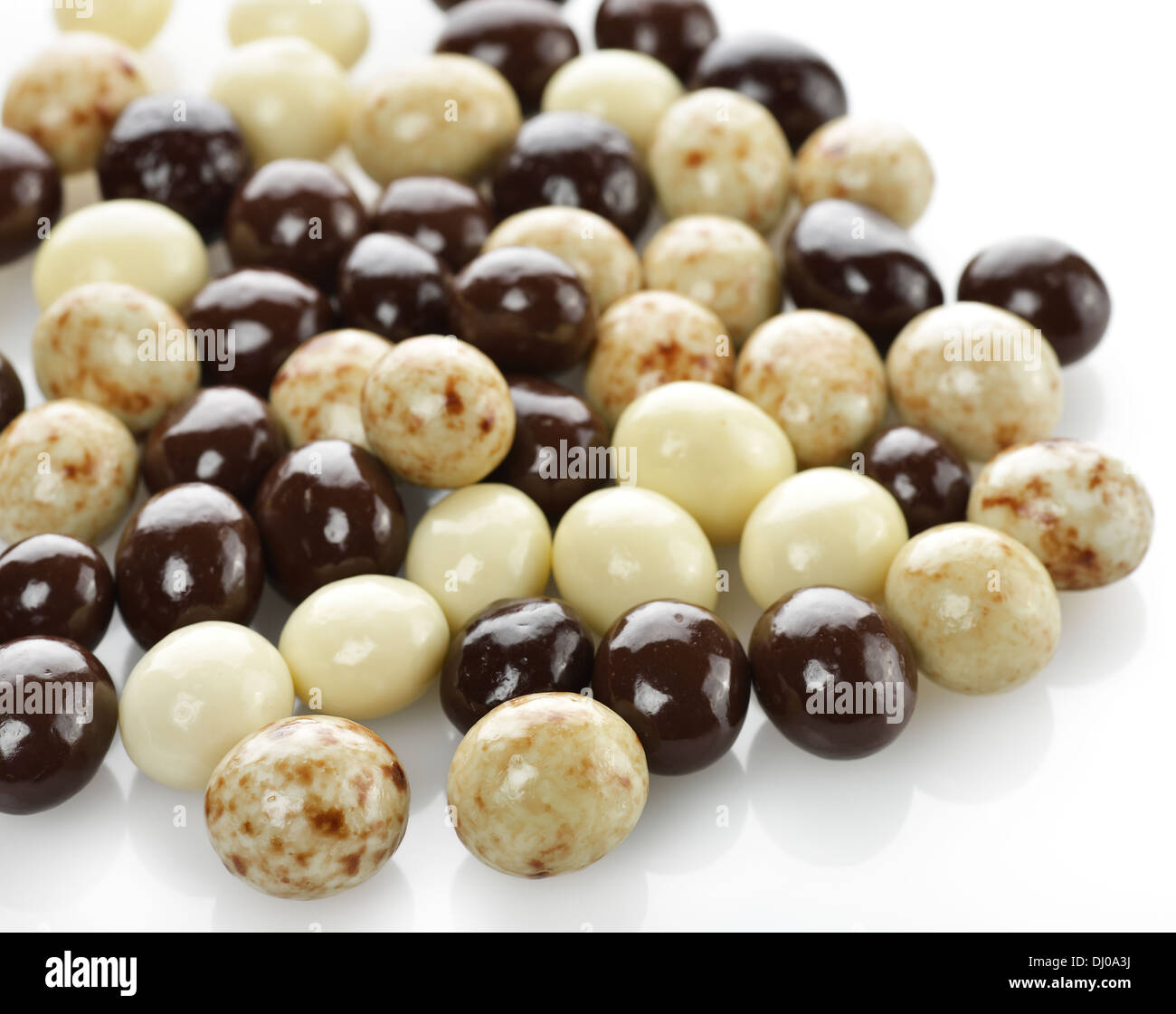 Chocolate Round Candies On White Background Stock Photo - Alamy