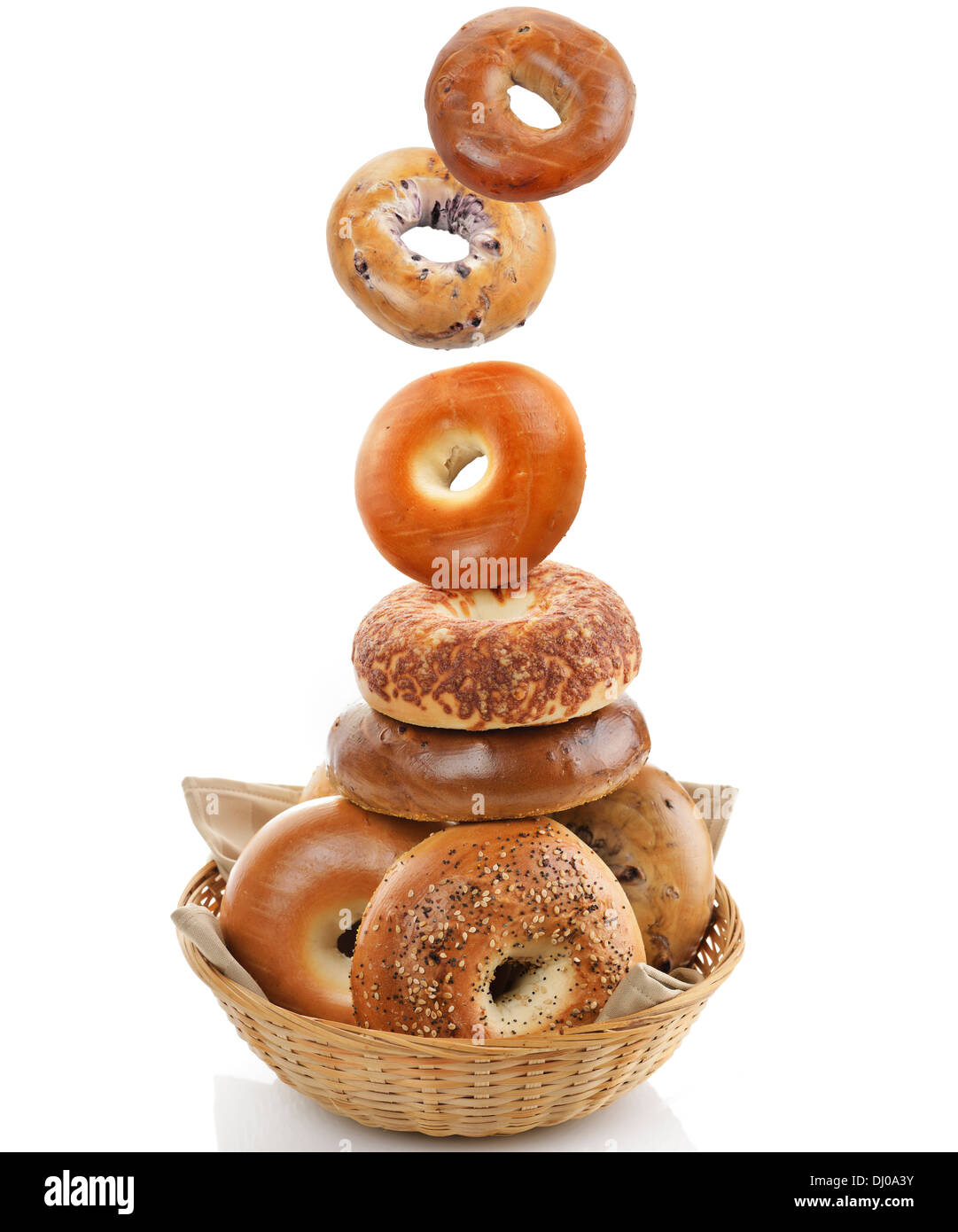 Bagels In A Basket On White Background Stock Photo - Alamy