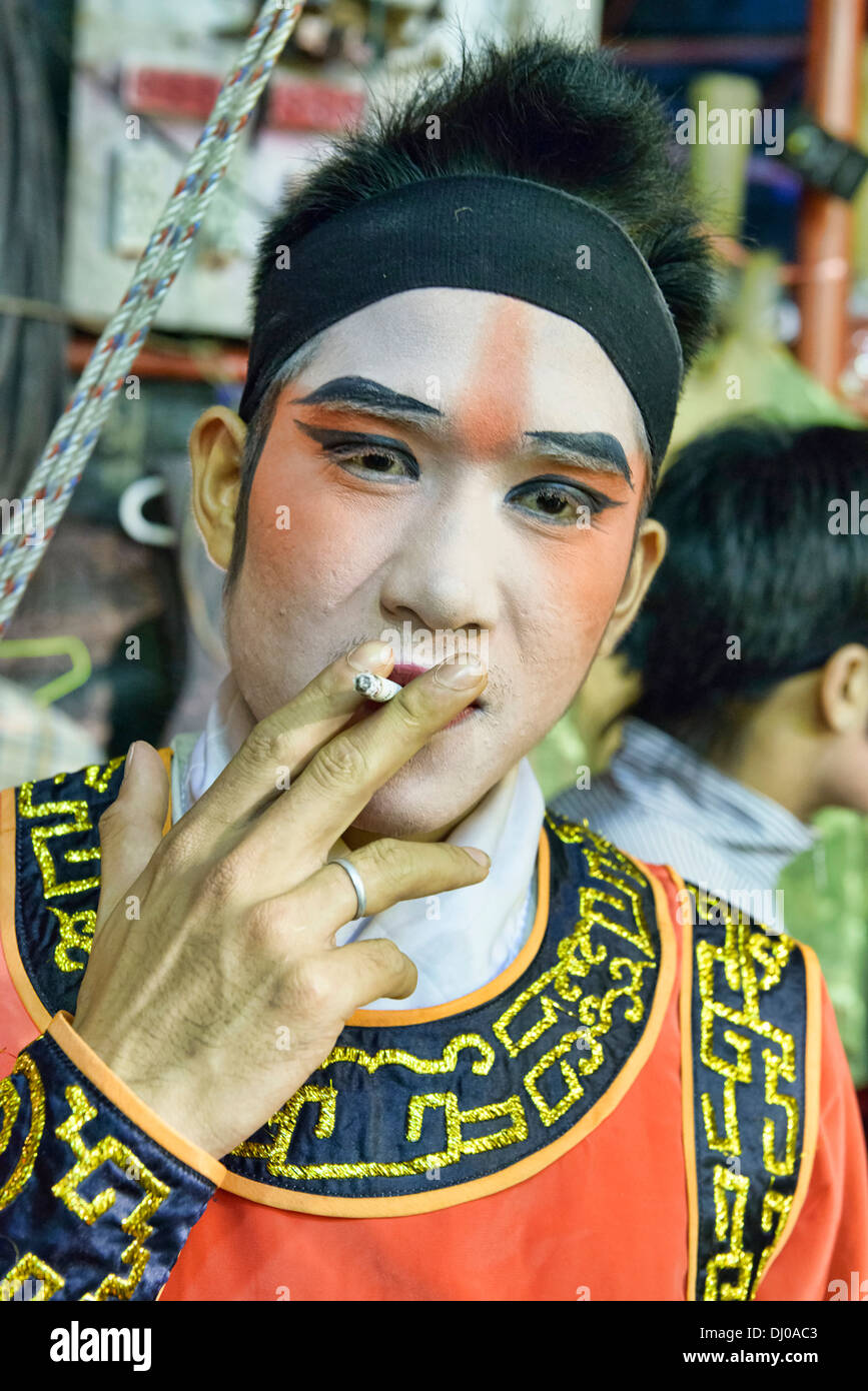 Chinese opera performer prepares for a performance at the Vegetarian ...