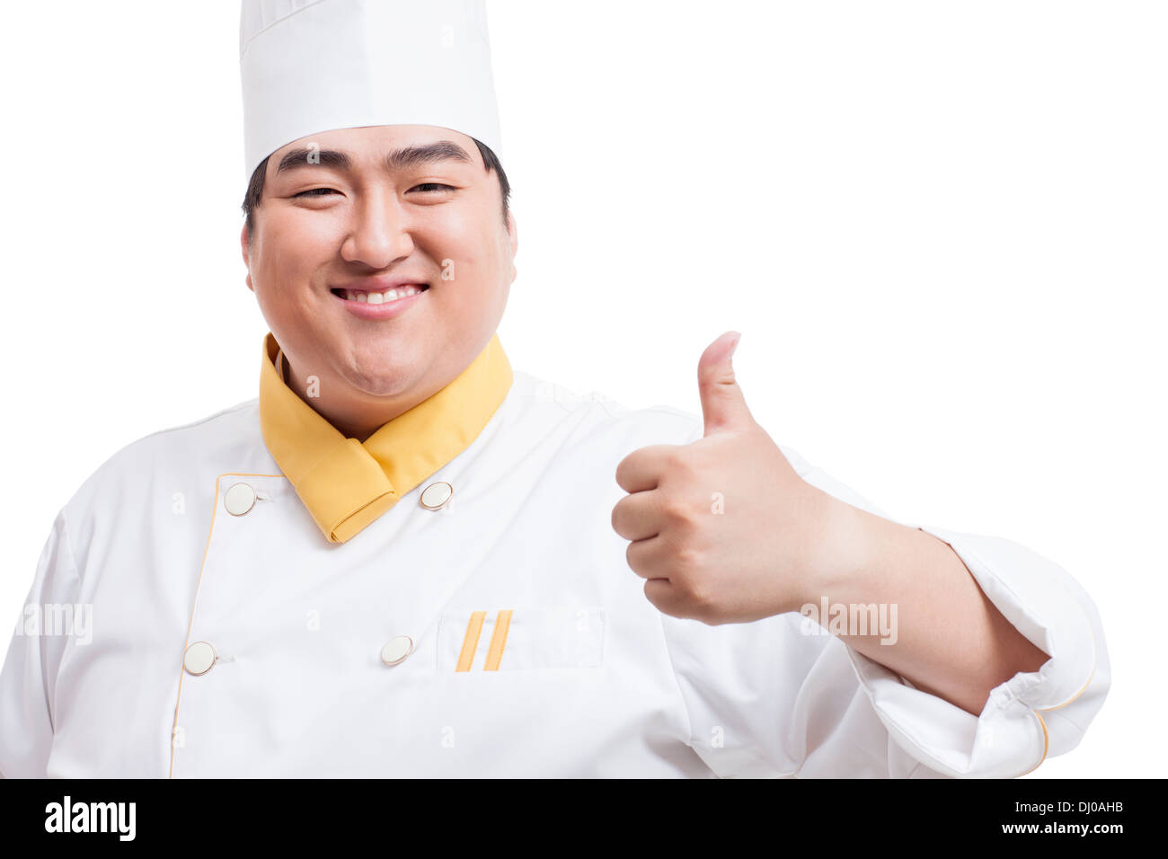 Cheerful Chubby cook doing thumbs up Stock Photo - Alamy