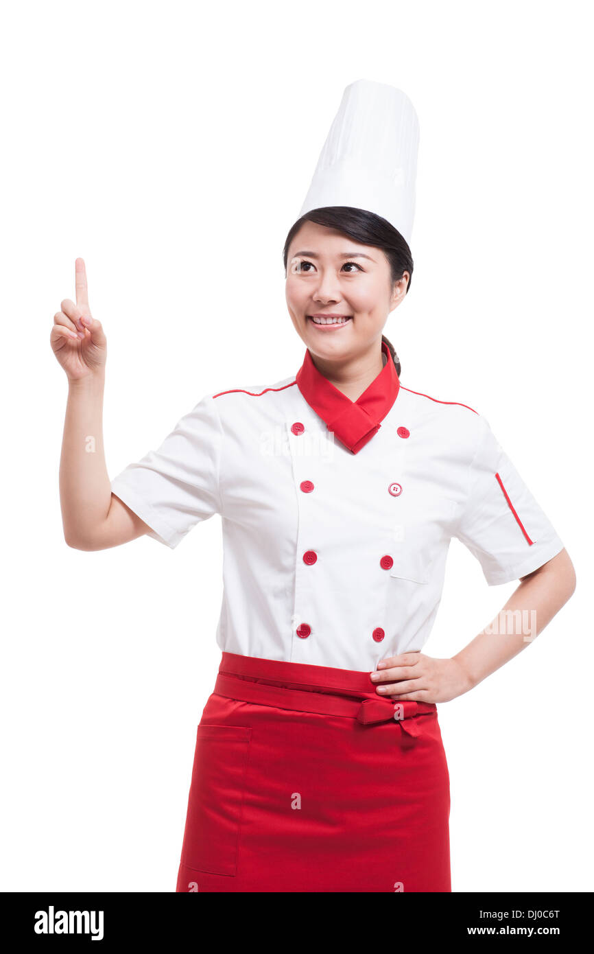 Standing pointing smiling uniform hat hi-res stock photography and ...