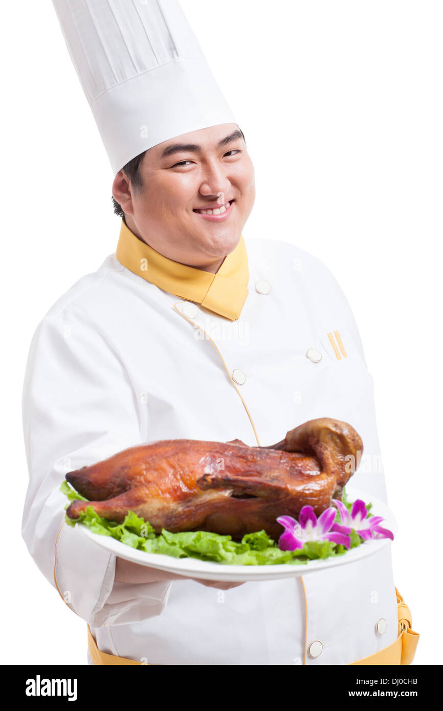 Chubby cook with roast duck Stock Photo - Alamy