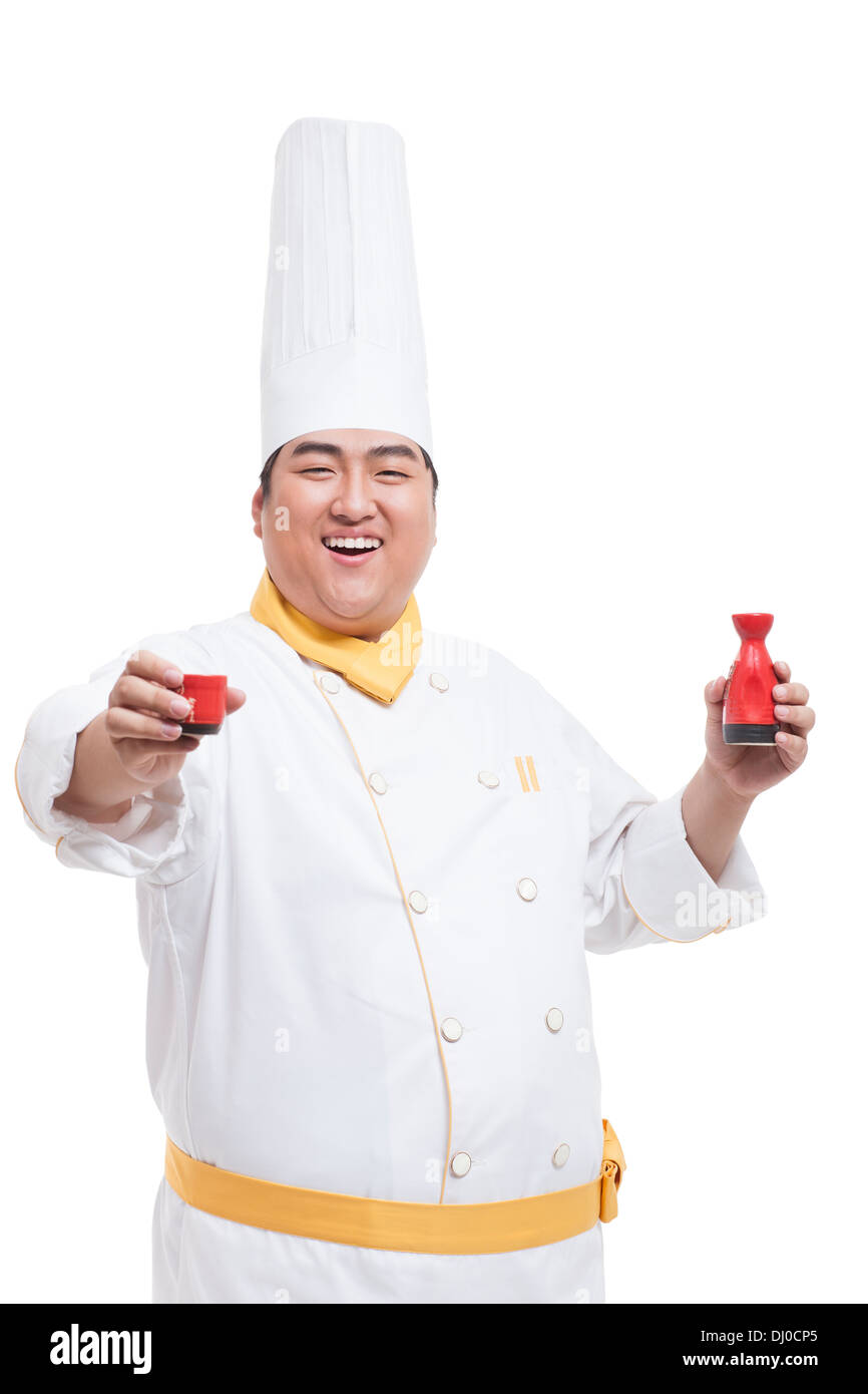 Chubby cook tasting wine Stock Photo - Alamy