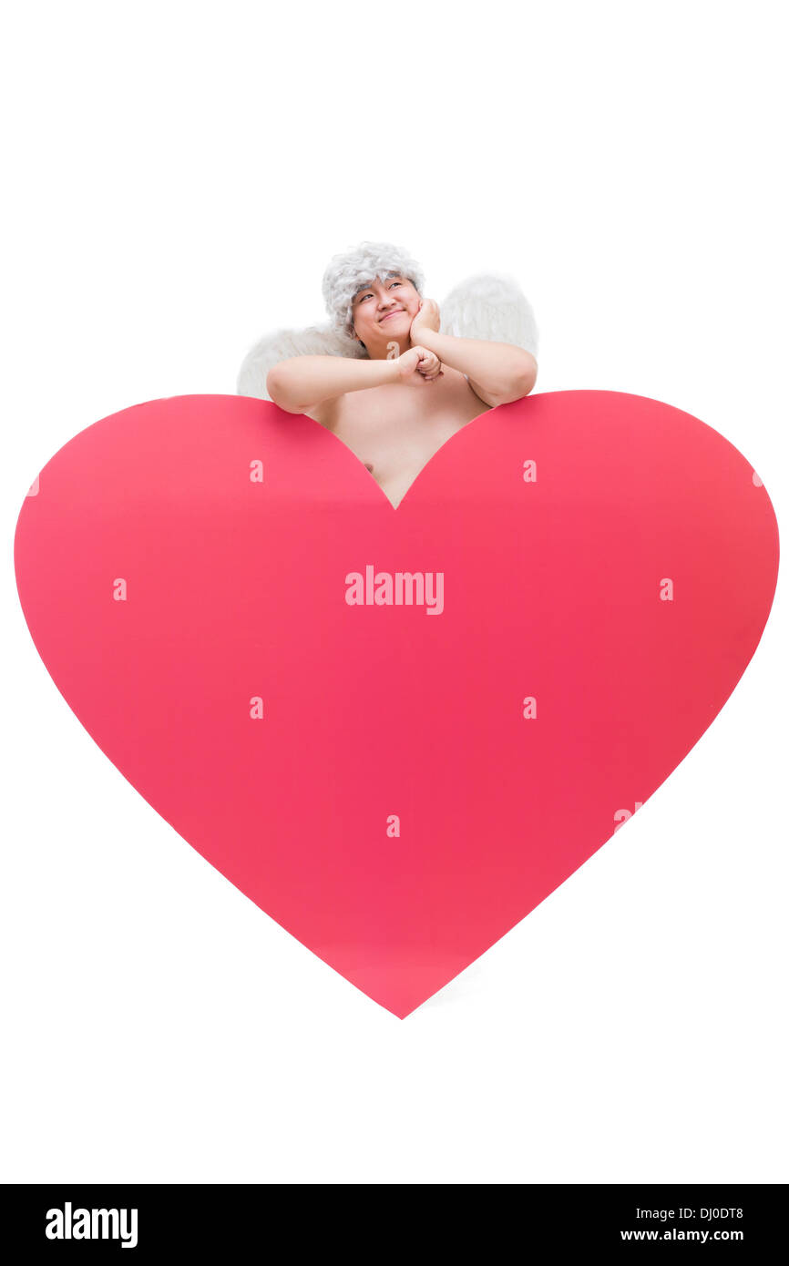 Chubby angel with a big heart shape Stock Photo - Alamy