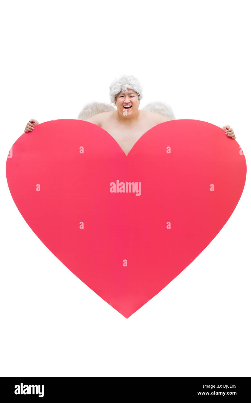 Chubby angel with a big heart shape Stock Photo - Alamy
