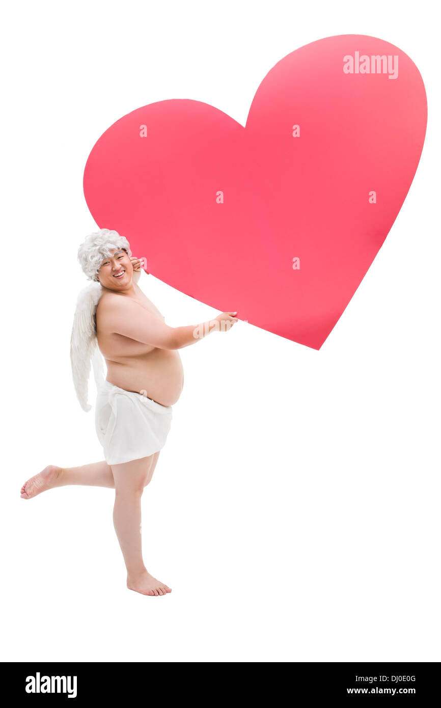 Chubby angel with a big heart shape Stock Photo - Alamy