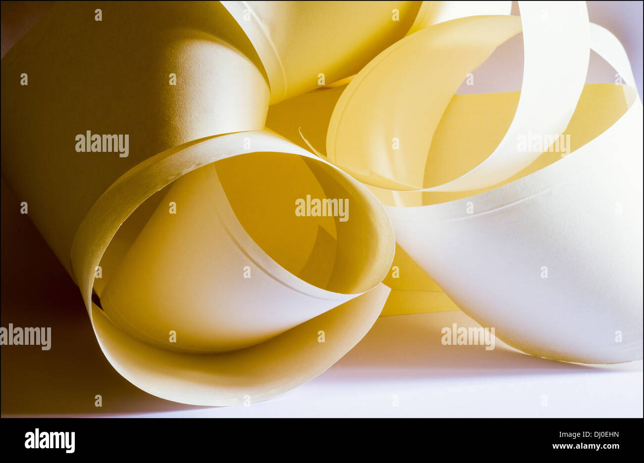 Yellow paper rolls Stock Photo - Alamy