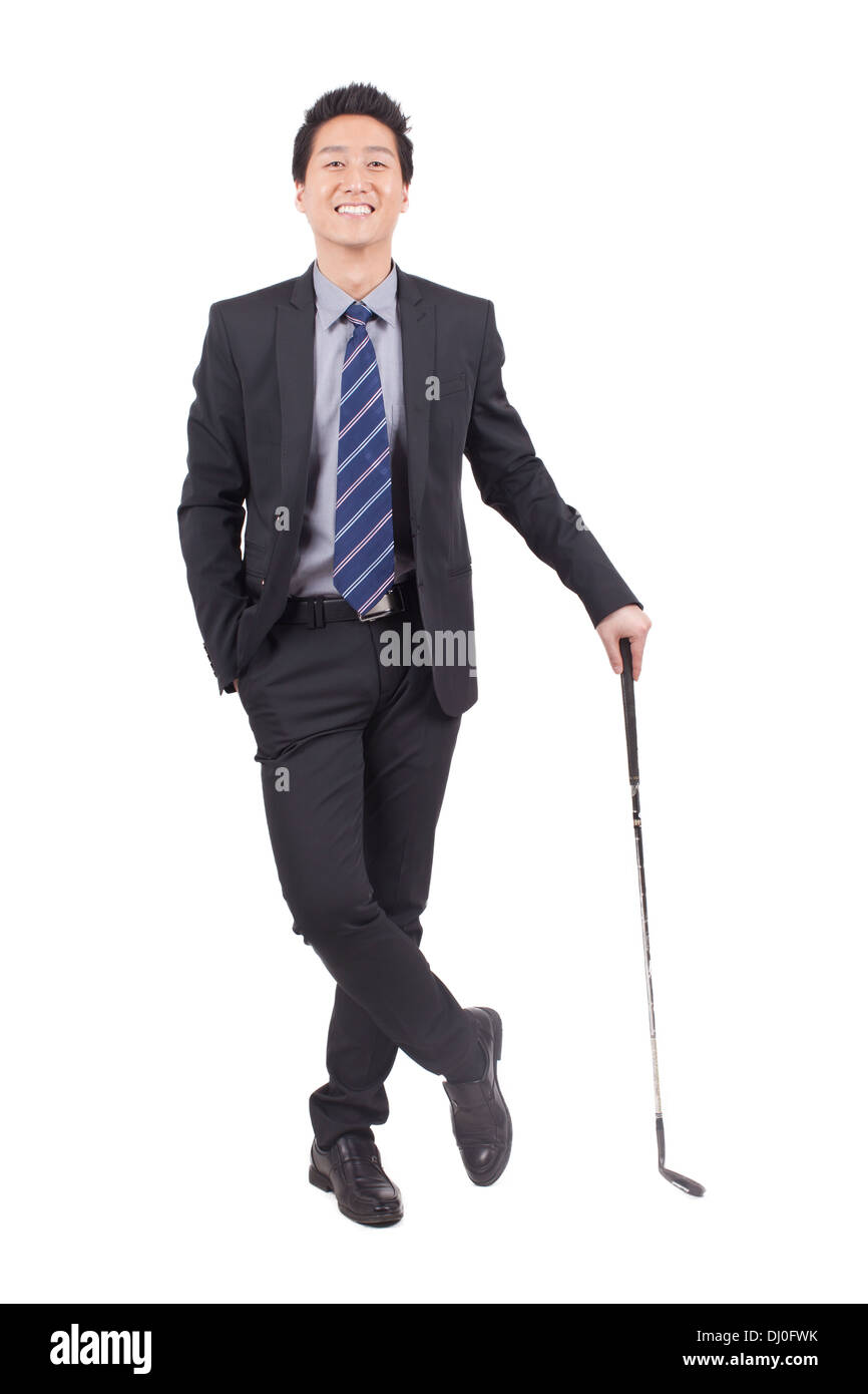 Business man holding golf swing and smiling at the camera Stock Photo ...
