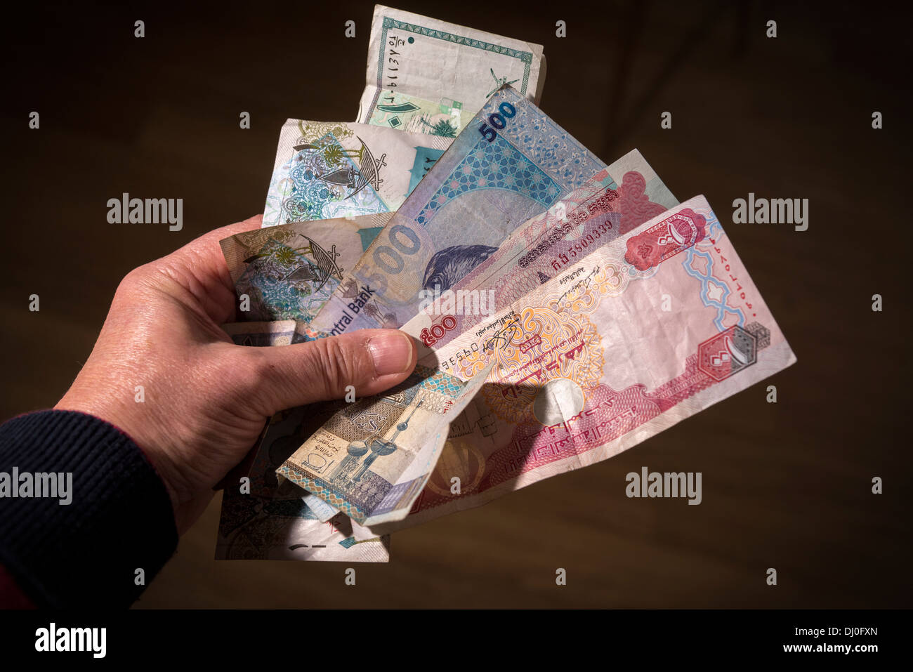 Notes Cash Currency Asian Middle Eastern changing hands. Money Stock ...