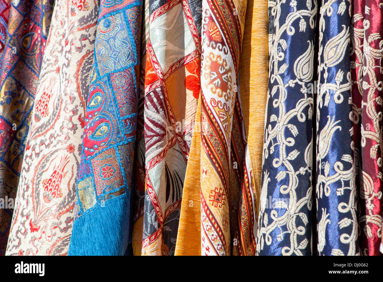 A colourful display of souvenir textiles at the picturesque hillside ...