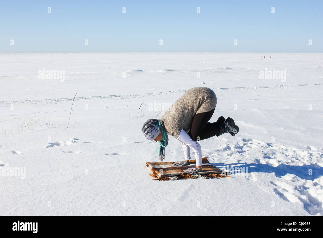 woman yoga pose winter outdoor snow white blue sky day "copy space ...