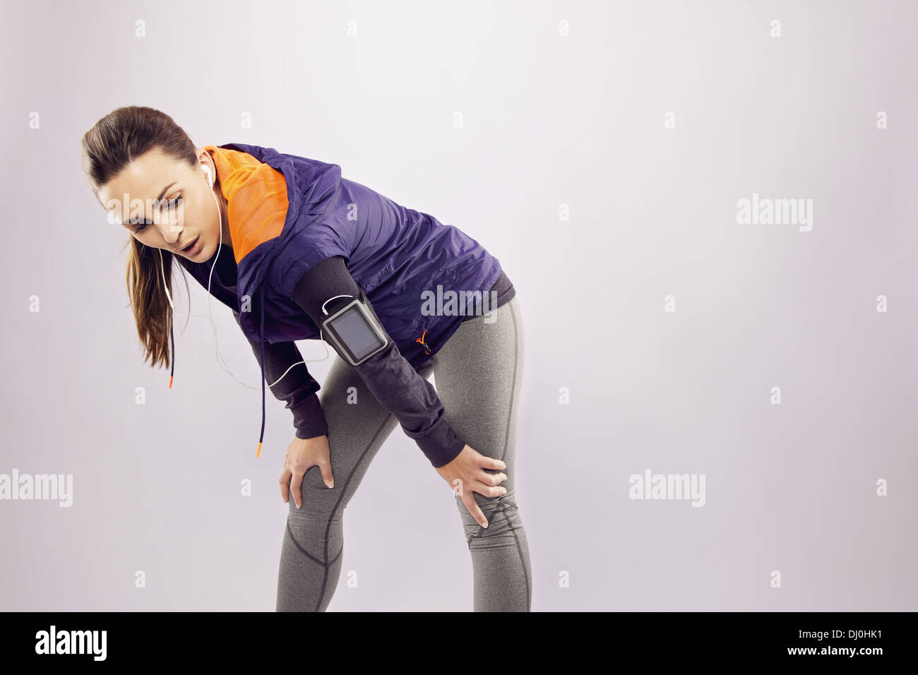 Hands resting on knees hi-res stock photography and images - Alamy